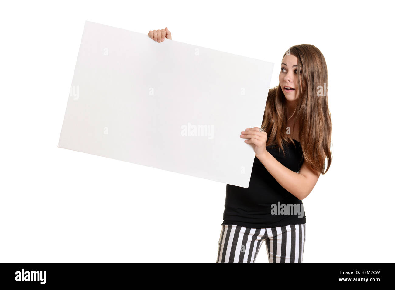Teen girl with white large white card Stock Photo - Alamy