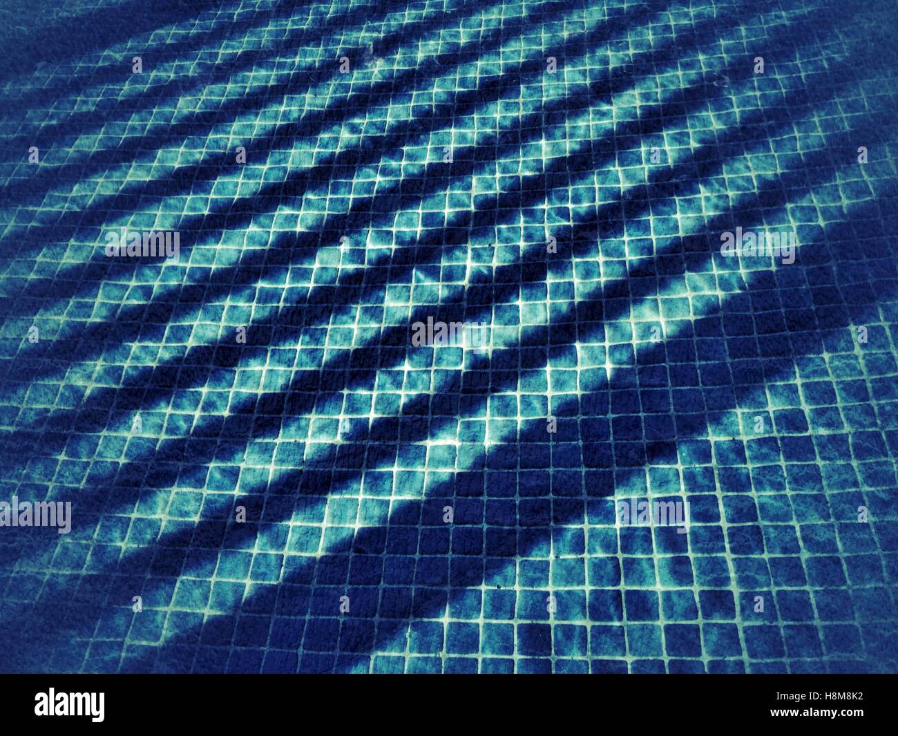 Shadows in a swimming pool Stock Photo - Alamy