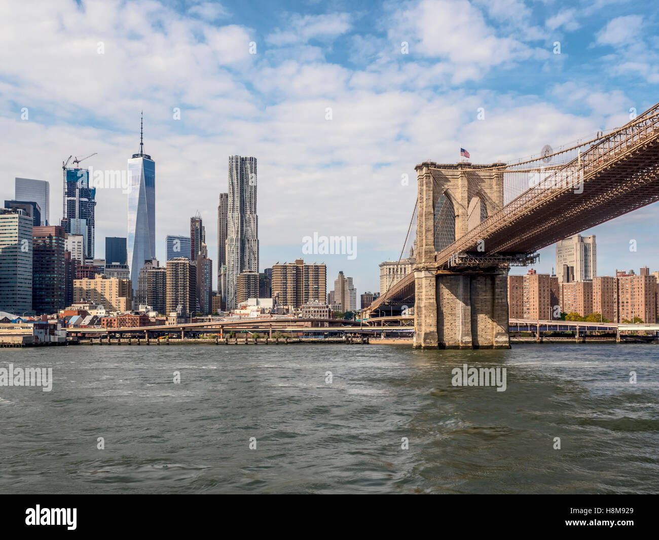 Brooklyn Bridge is a hybrid cable-stayed/suspension bridge in New York ...