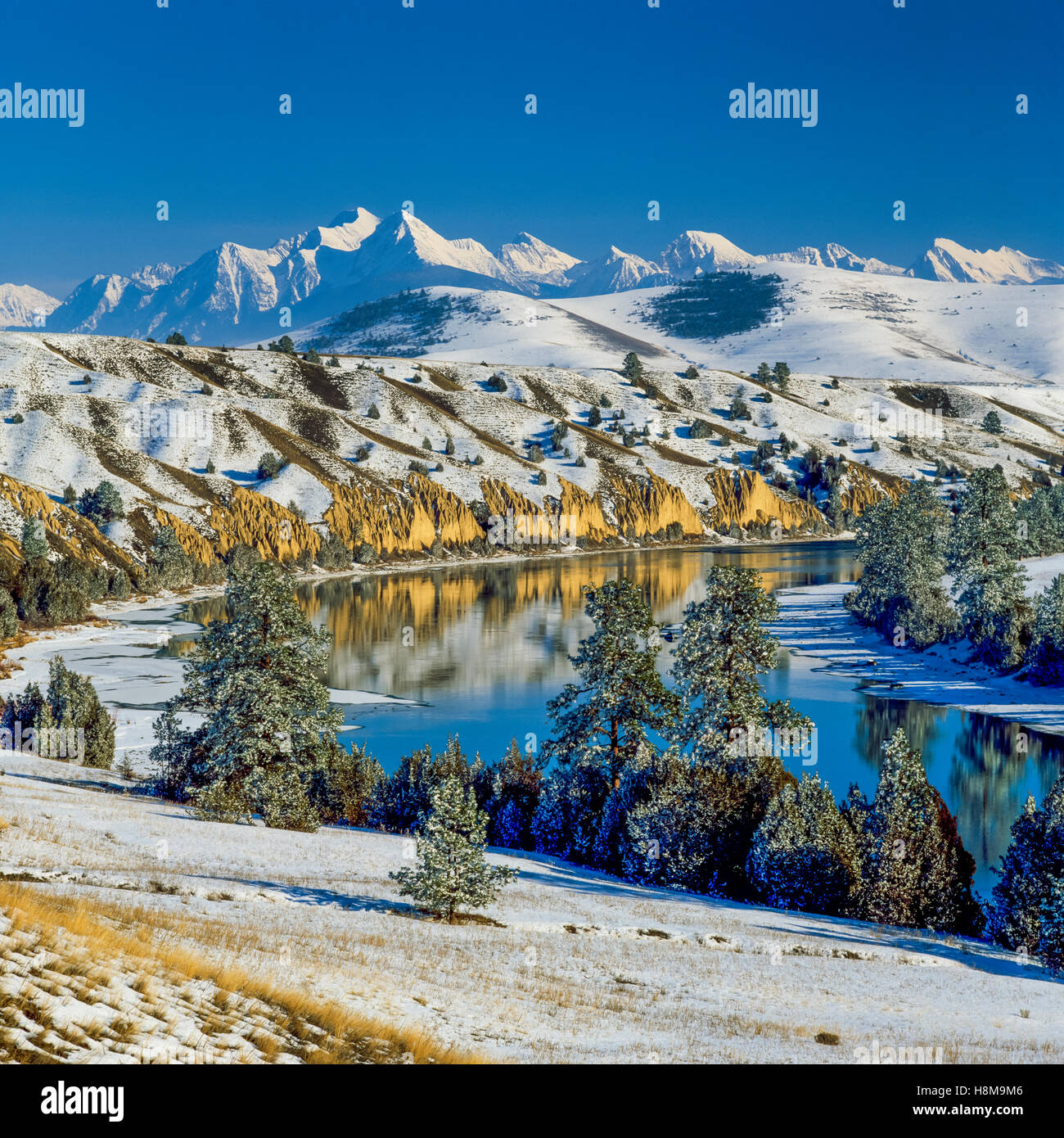 flathead river and mission mountains in winter near ronan, montana ...
