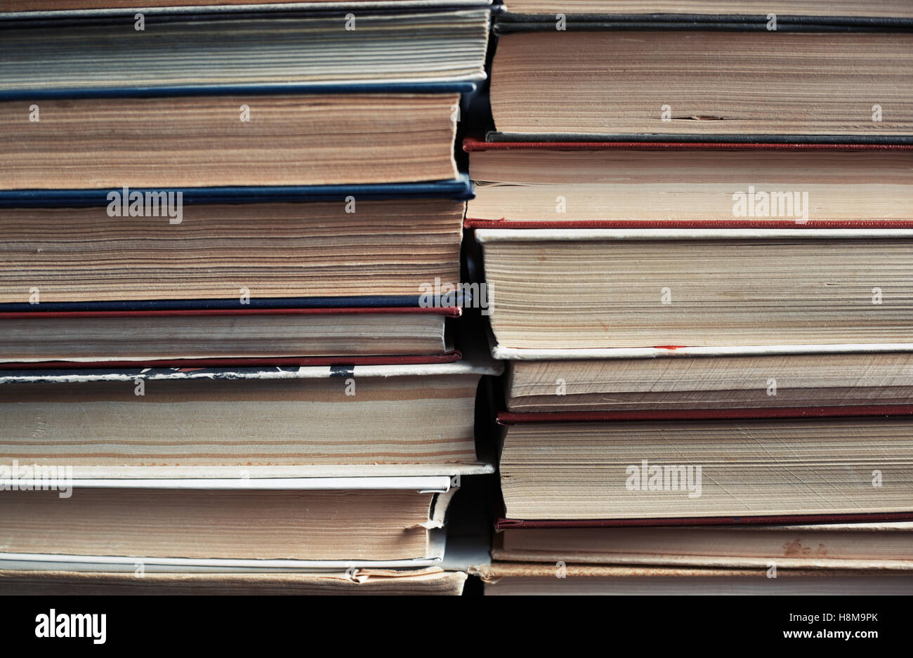 Stack of old worn books Stock Photo - Alamy