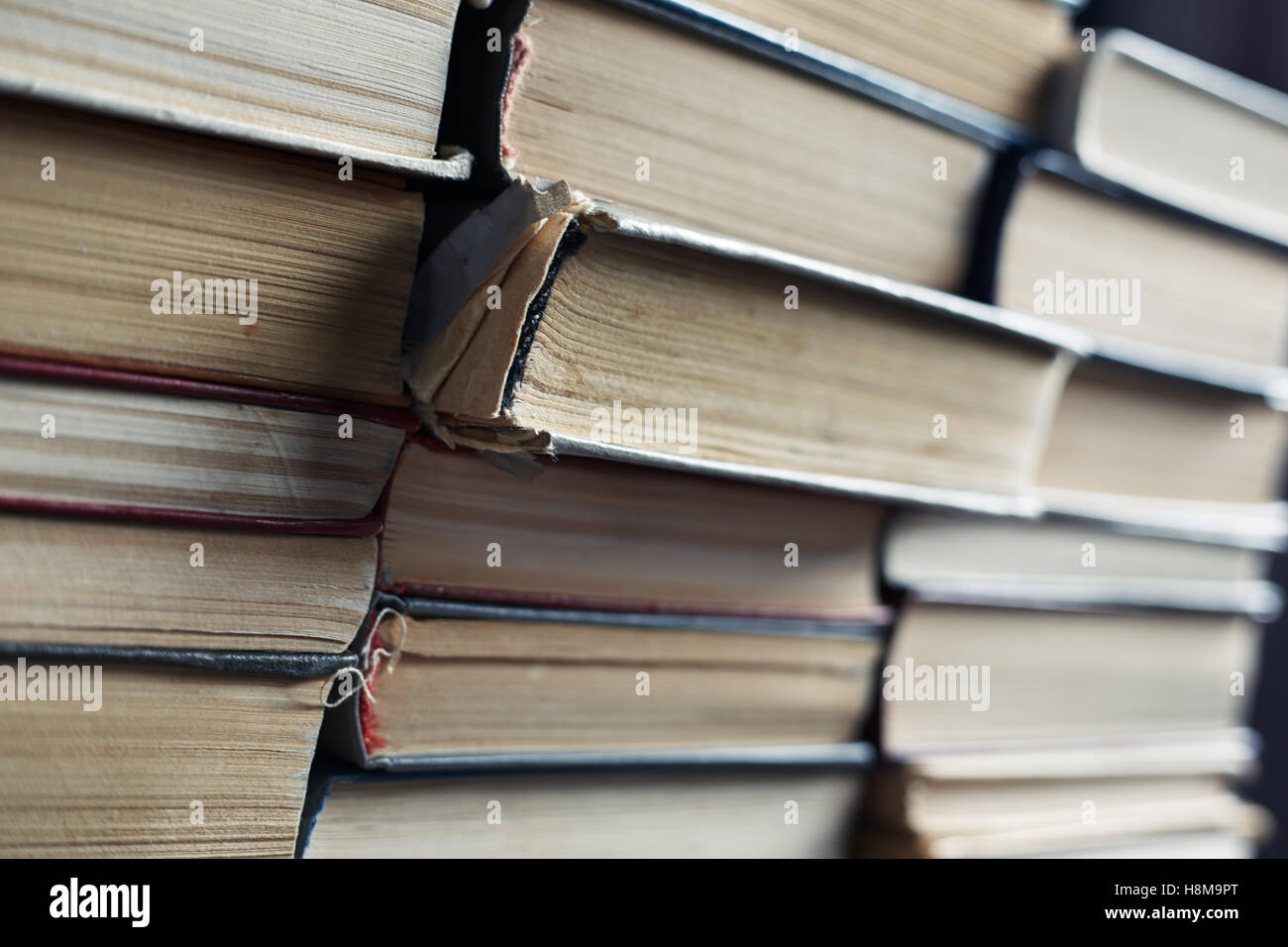 Stack of old worn books Stock Photo - Alamy