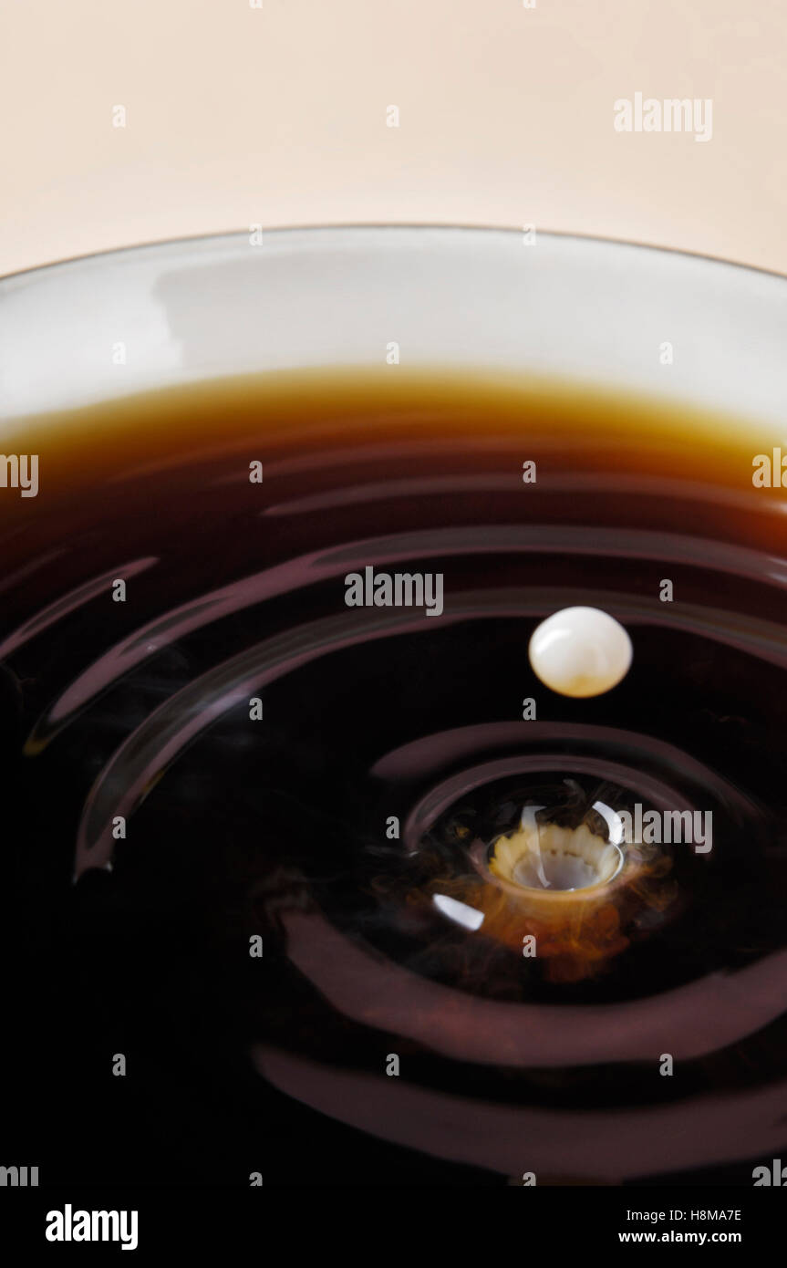 Dripping Into White Cup High Resolution Stock Photography and Images ...