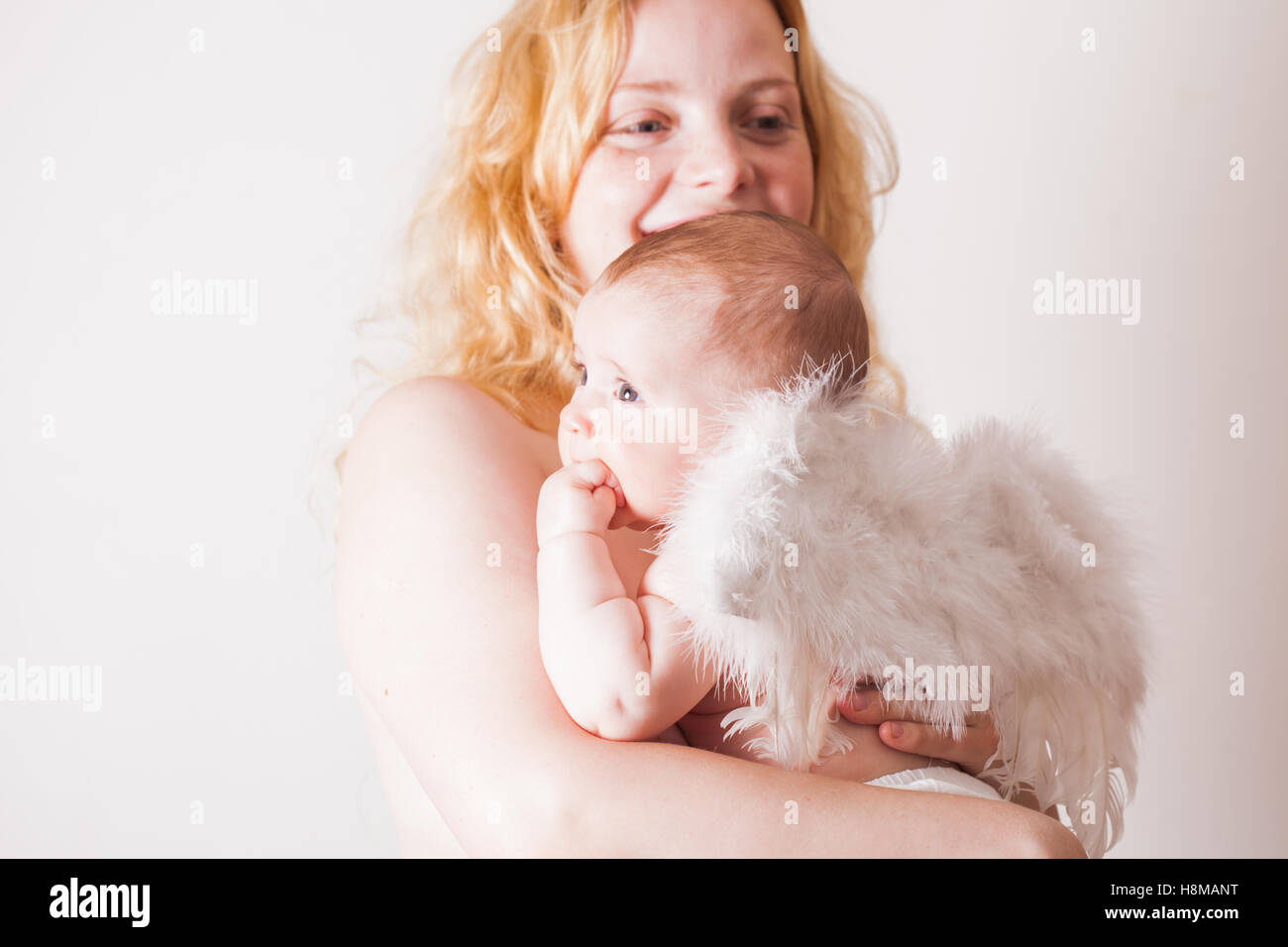 Angel hug hi-res stock photography and images - Alamy