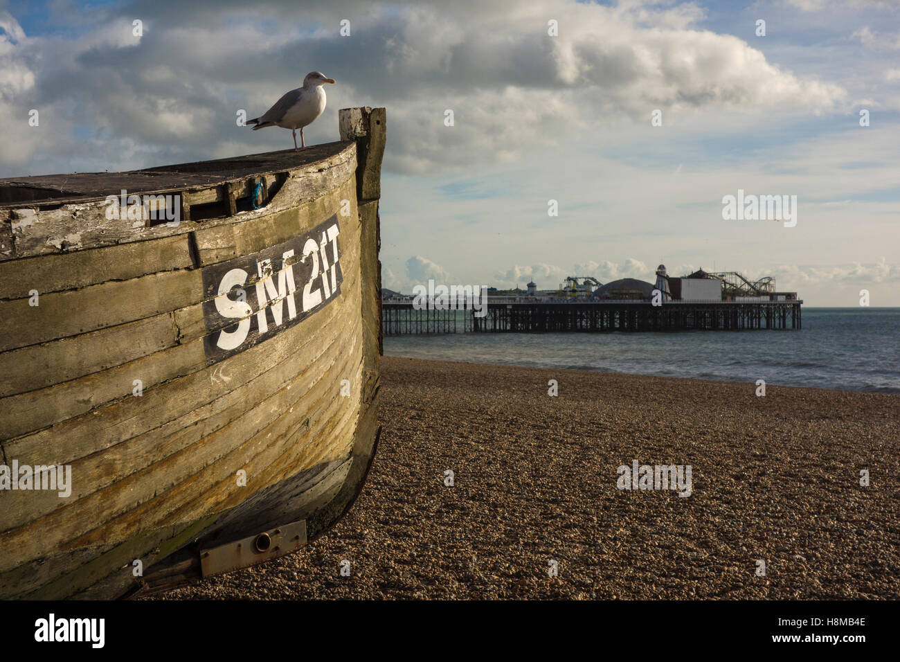Brighton beach with pier in background Stock Photo - Alamy