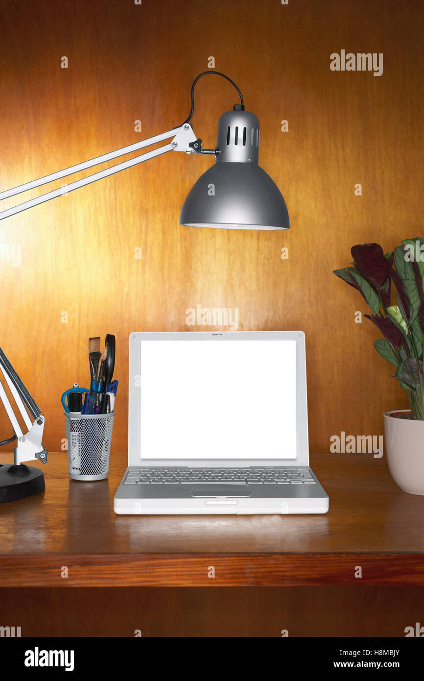 Laptop on desk Stock Photo - Alamy