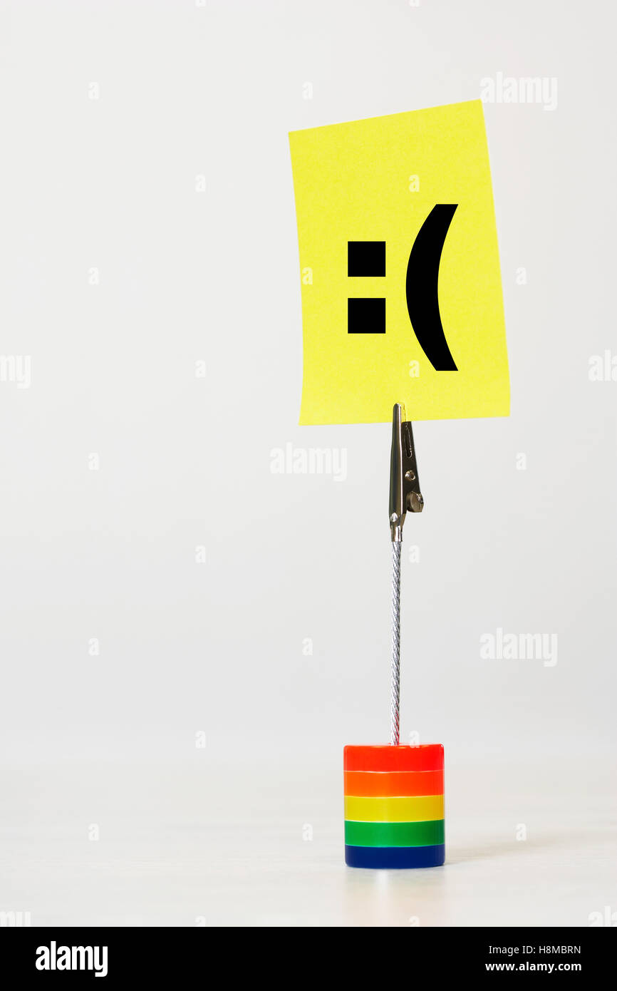 Sad face icon reminder note Stock Photo - Alamy