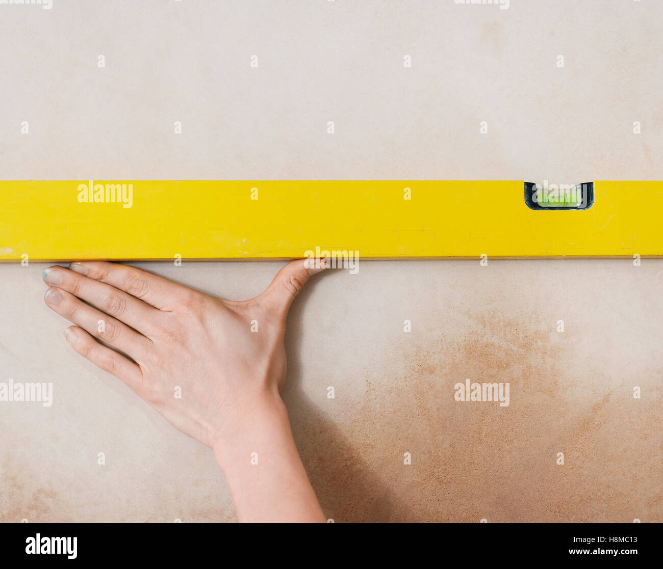 Using spirit level Stock Photo - Alamy