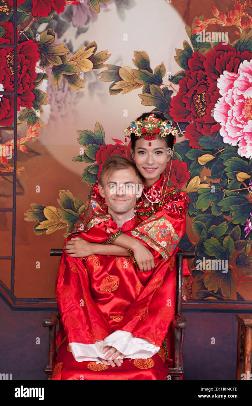 Chinese wedding couple in traditional hi-res stock photography and ...