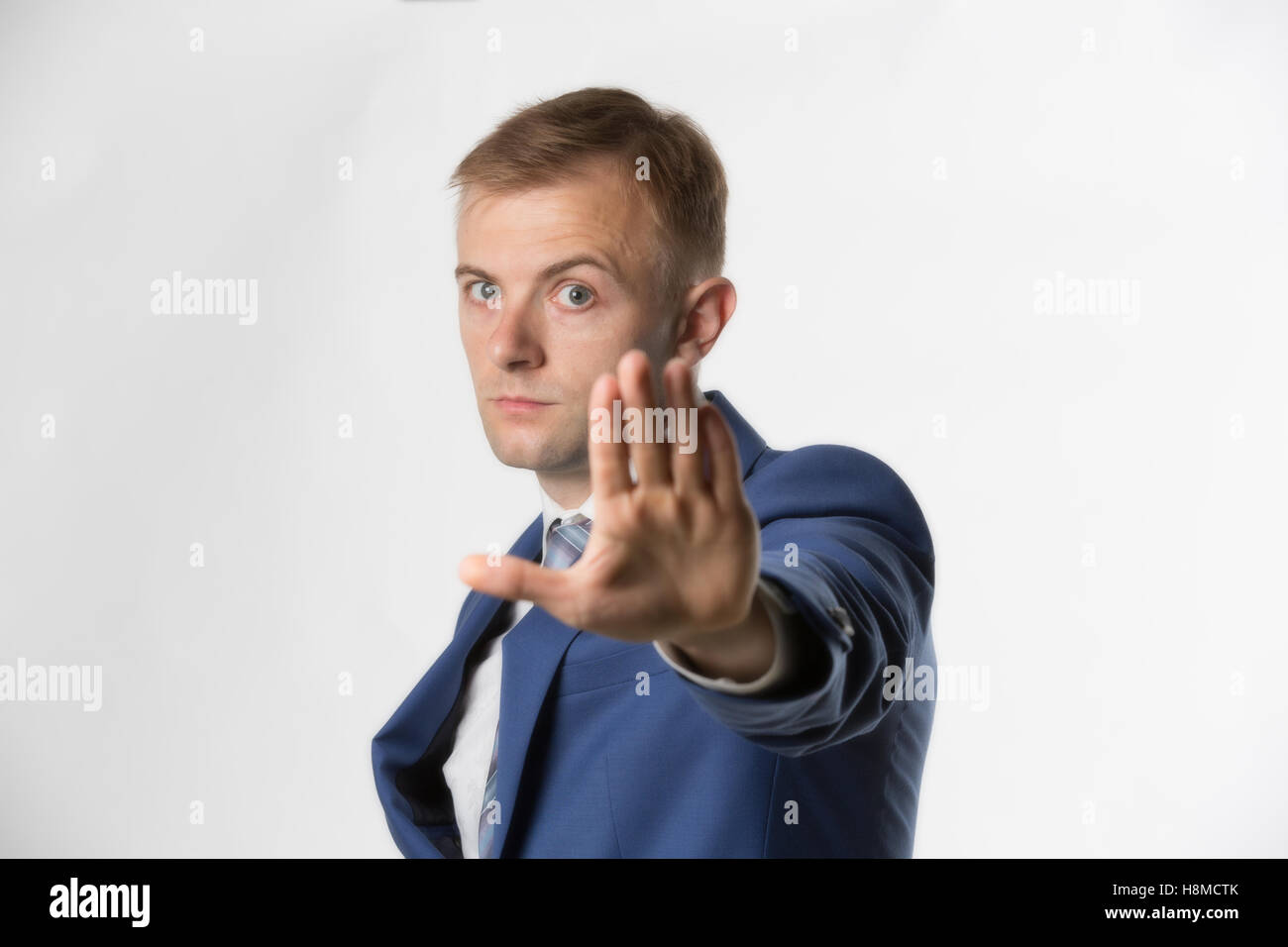 Man hand holding stop sign hi-res stock photography and images - Alamy