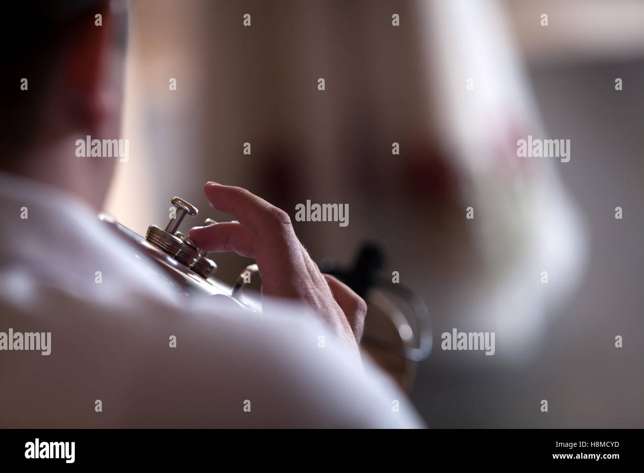 Trumpet player performing a jazz song with his band Stock Photo - Alamy
