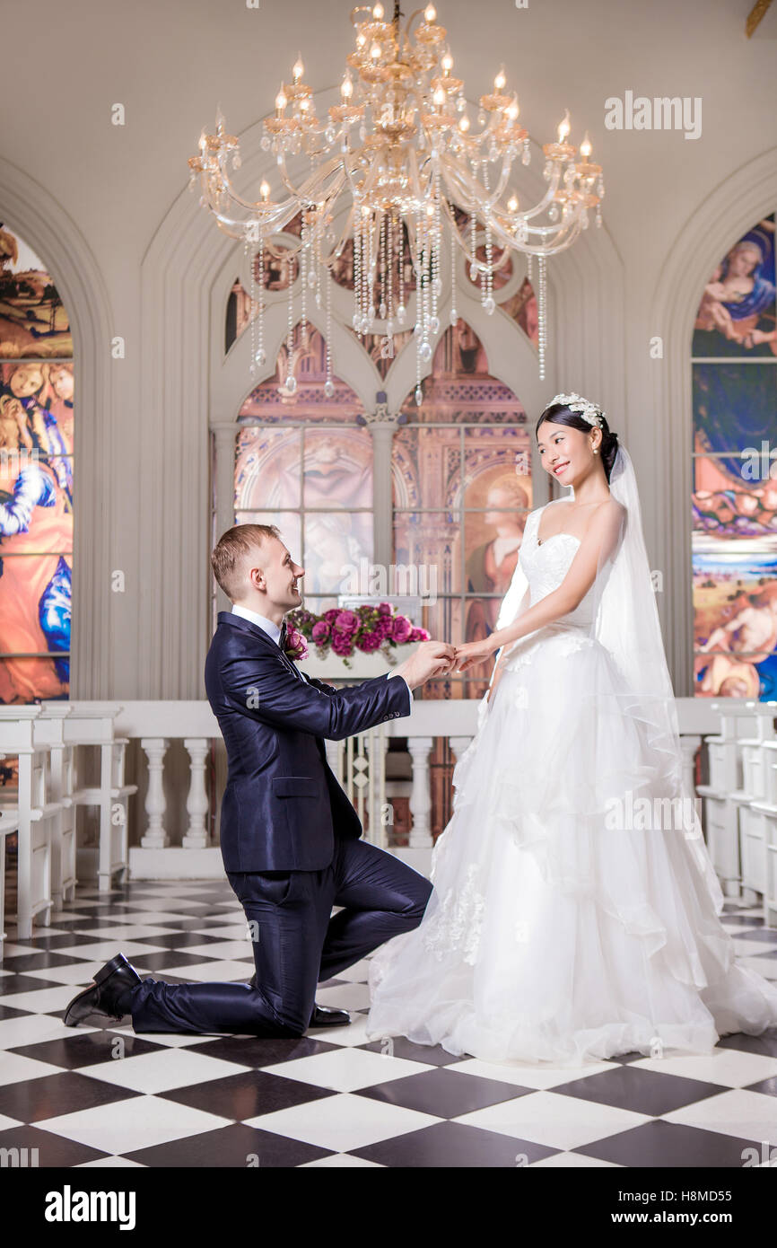 Putting ring on finger hi-res stock photography and images - Alamy