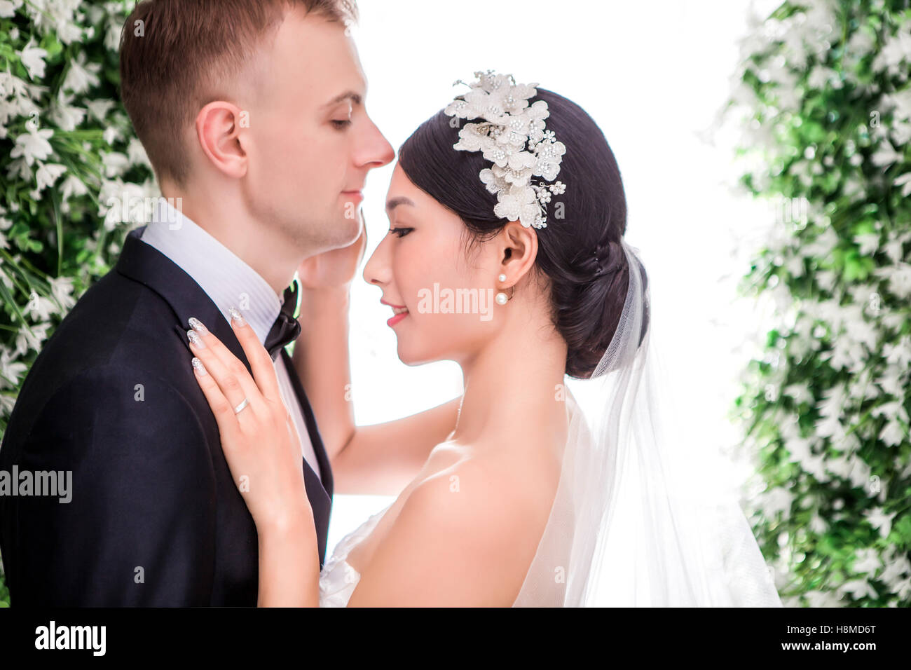Side profile of two men standing face to face hi-res stock photography ...