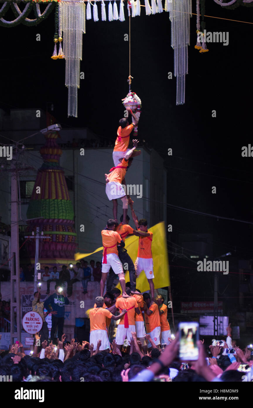 Human pyramid breaking dahi handi on janmashtami festival, Pune Stock ...