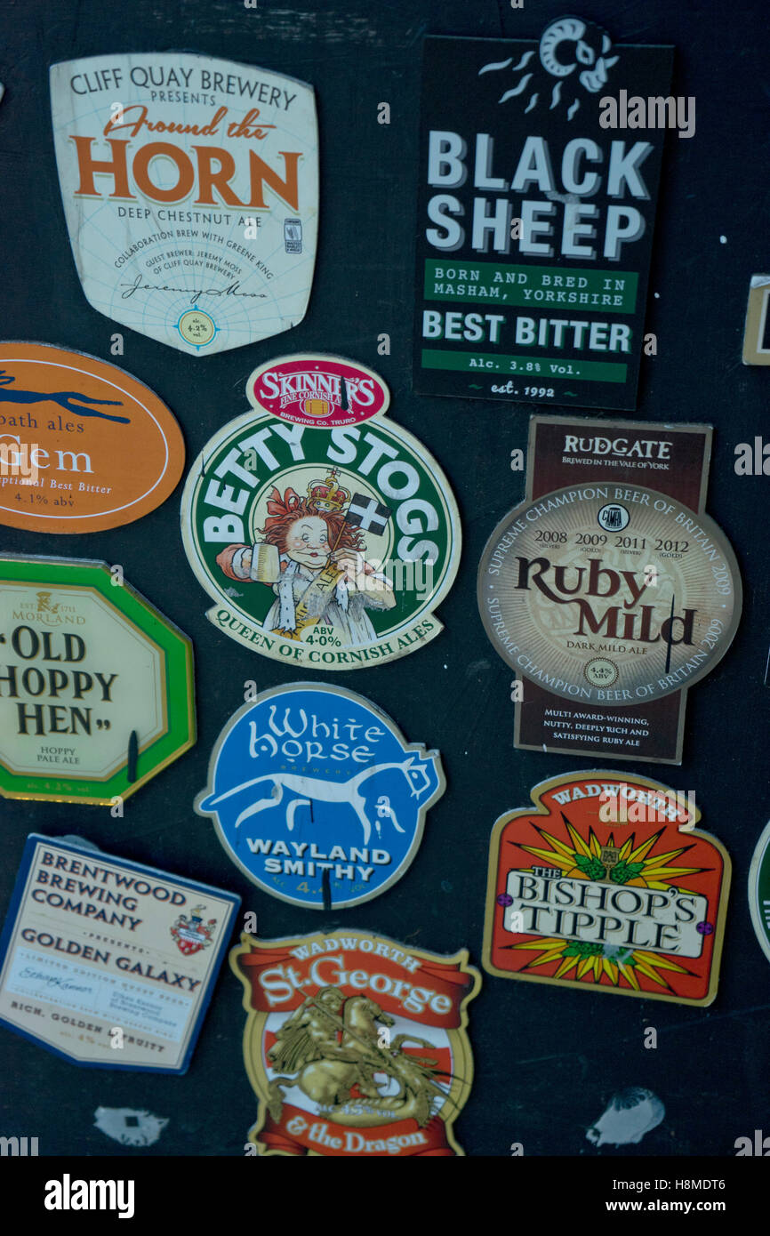 Signs of real ale English beers advertised in a pub in Cheltenham ...
