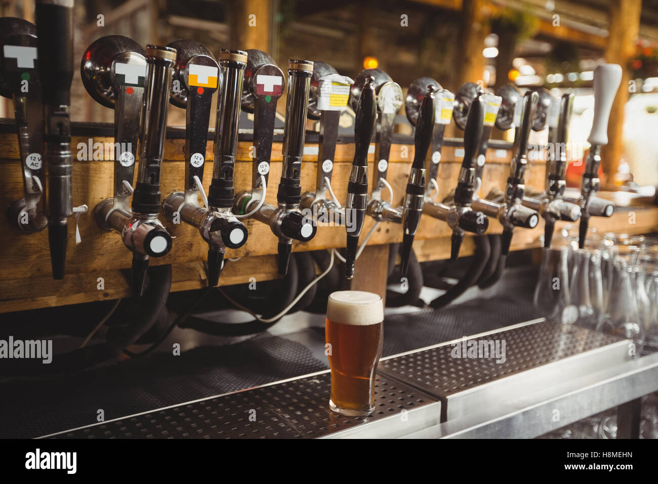 Close-up of beer pump in a row Stock Photo - Alamy