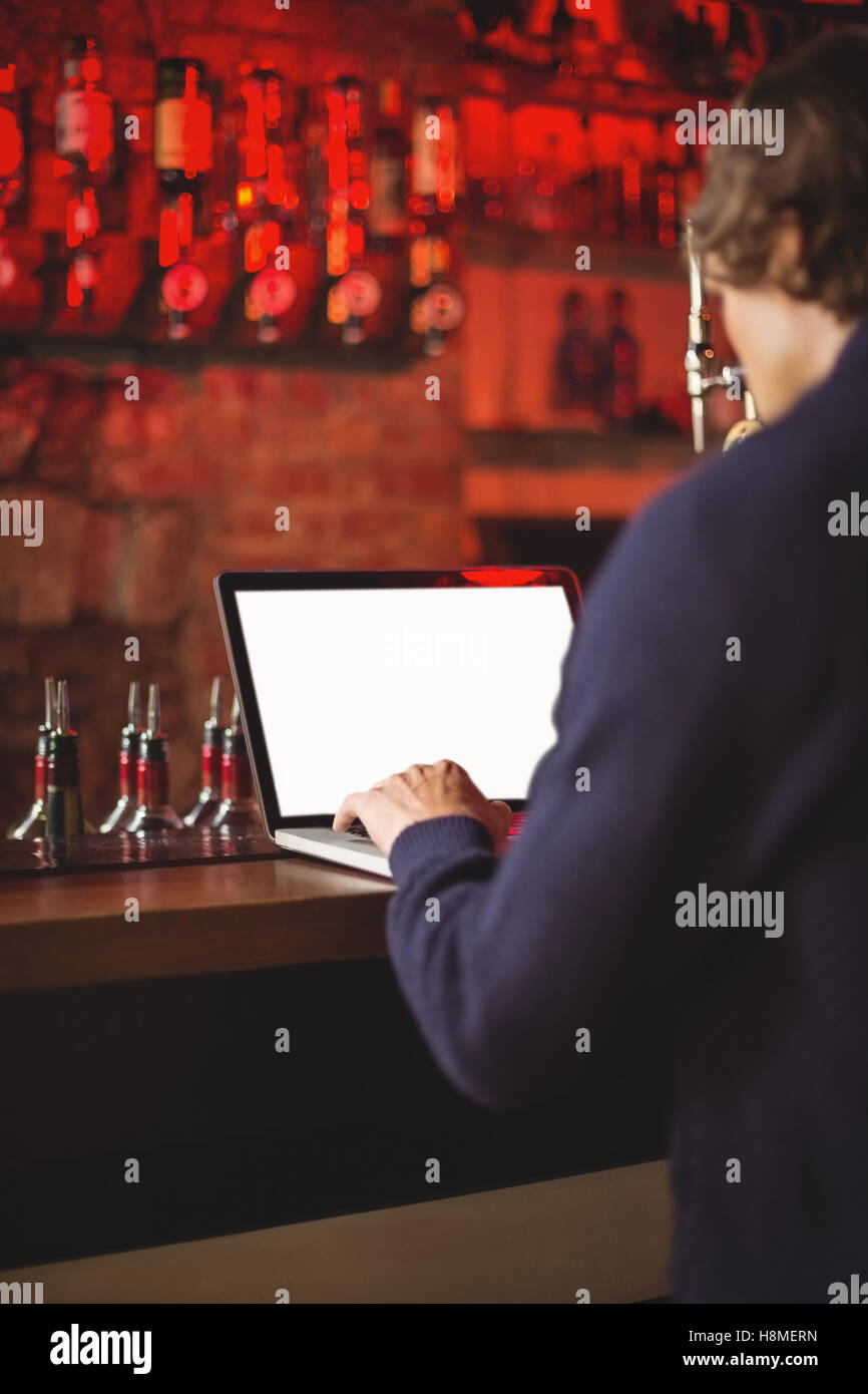 Man using laptop Stock Photo - Alamy