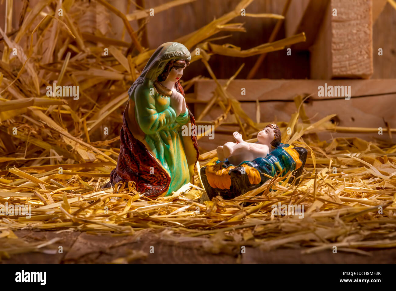 Christmas Manger scene with figurines including Jesus and Mary. Focus ...