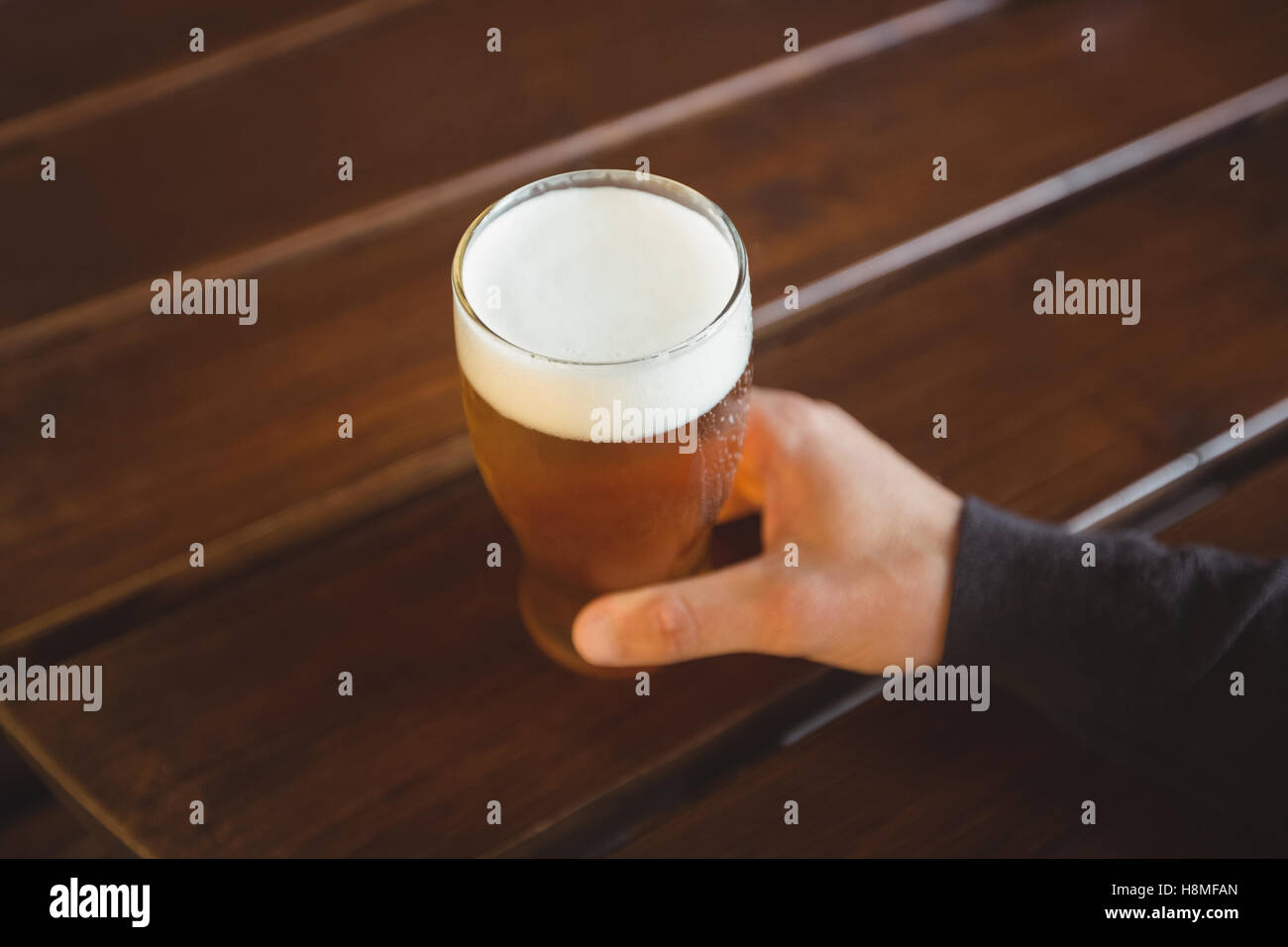 Man with glass of beer Stock Photo - Alamy