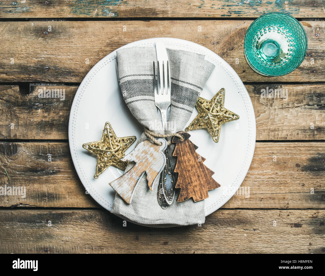 Christmas, New Year holiday table setting over wooden background Stock ...