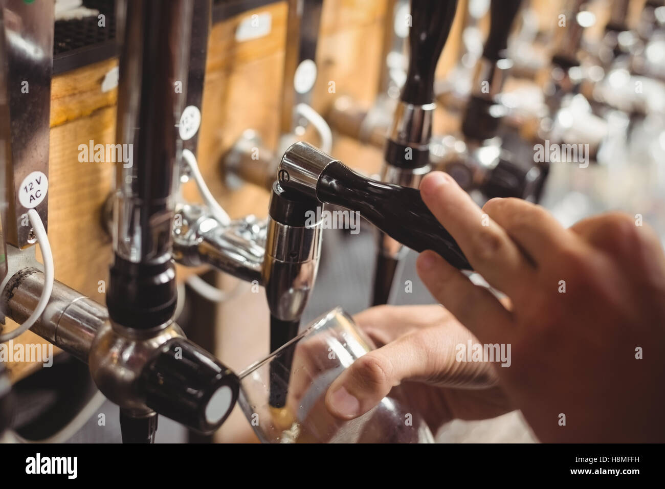 Close up staff filling glass hi-res stock photography and images - Alamy