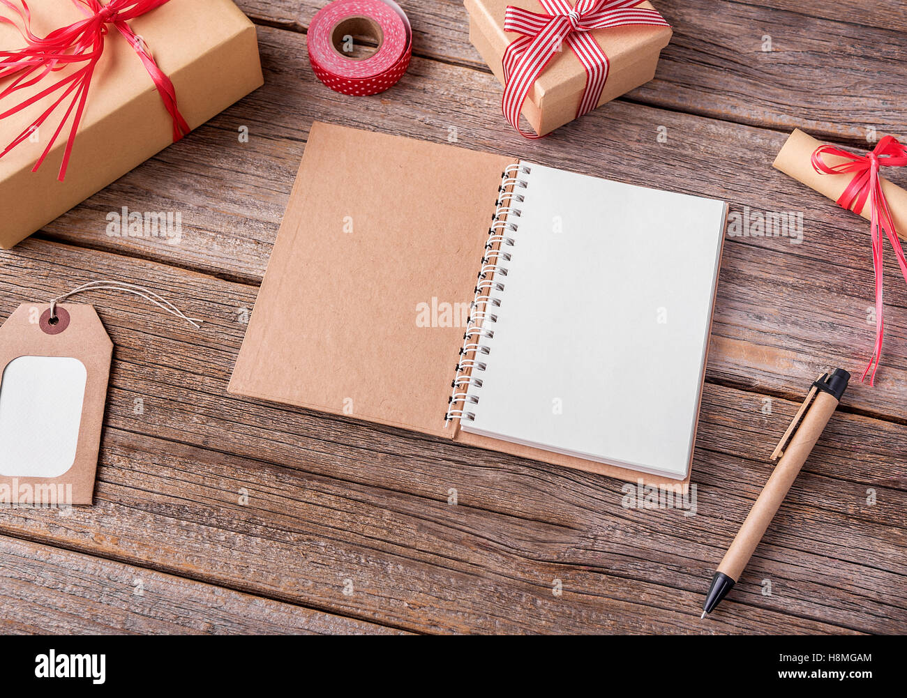 Notebook and Christmas gifts Stock Photo - Alamy