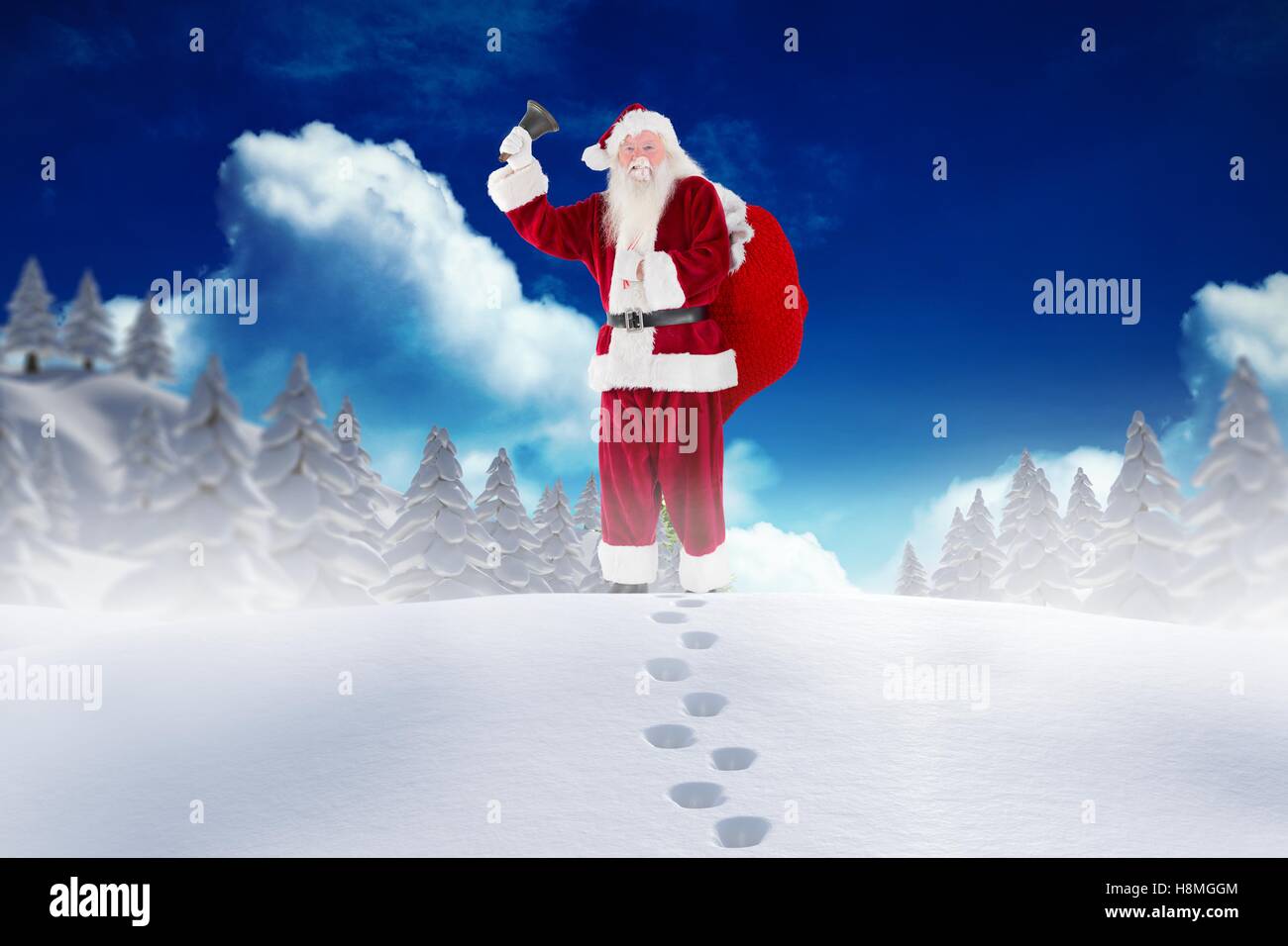 Santa claus standing in snow during christmas time Stock Photo - Alamy