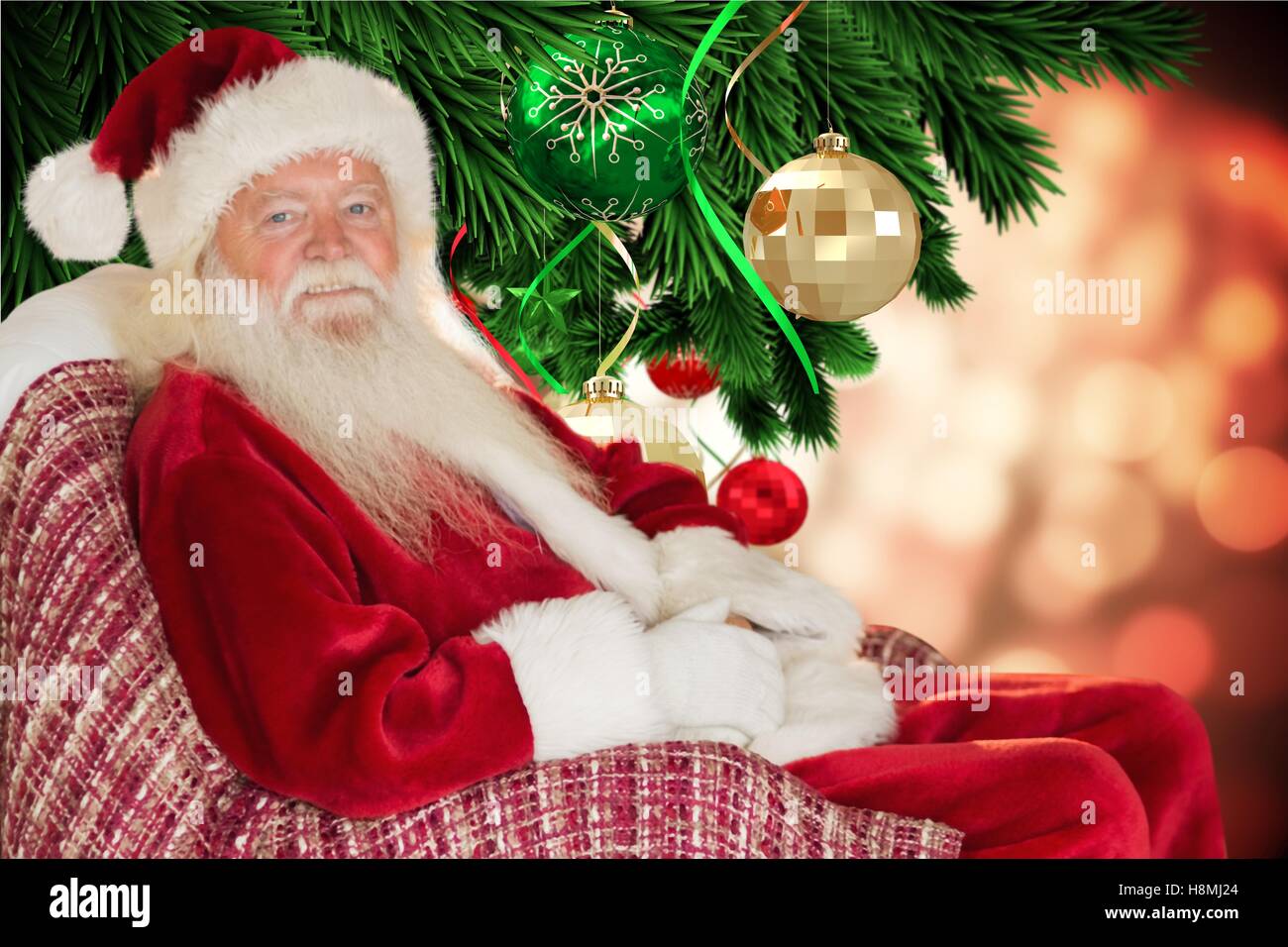 Portrait of santa claus sitting on chair Stock Photo - Alamy