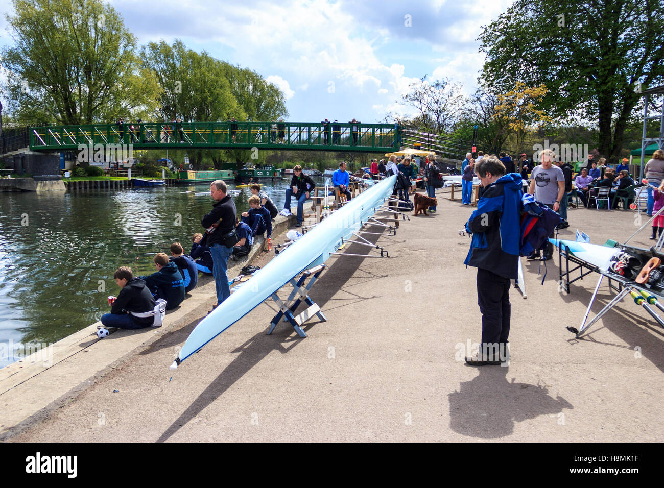 Upturned racing boat (shell) and spectators at a competitive rowing ...