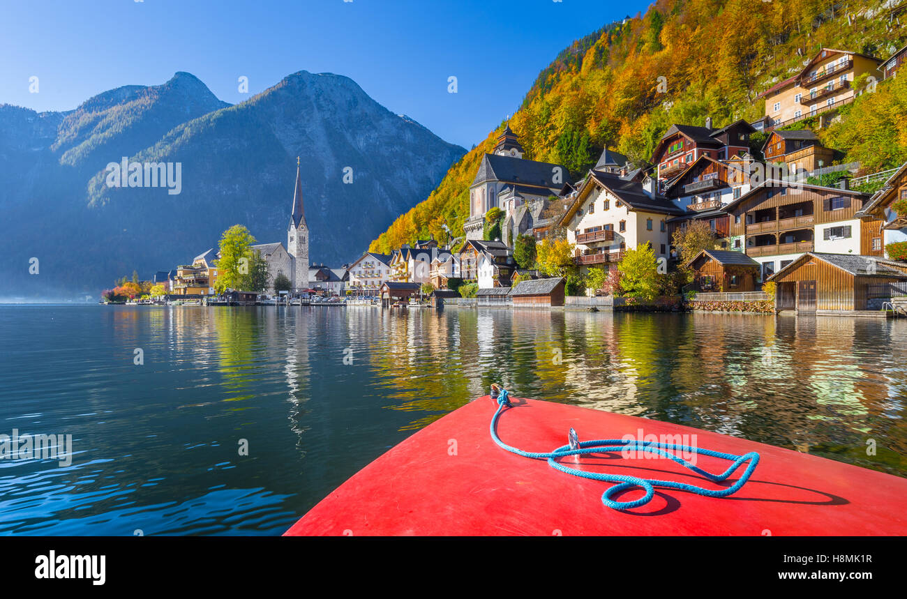 Scenic picture-postcard view of famous Hallstatt mountain village during a boat tour on ...