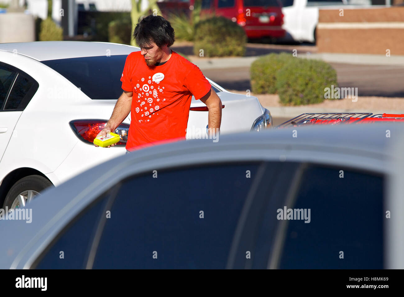 Trolley Boy Returns Shopping Carts At A Target Store Stock Photo - Alamy