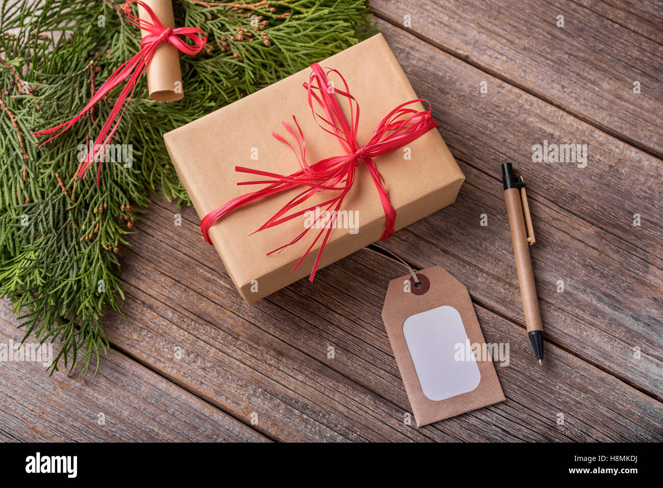 Christmas gift with a greeting card Stock Photo - Alamy