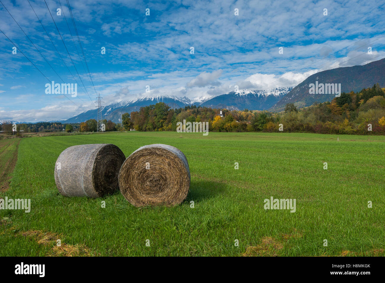 Hay bales mountains in background hi-res stock photography and images ...