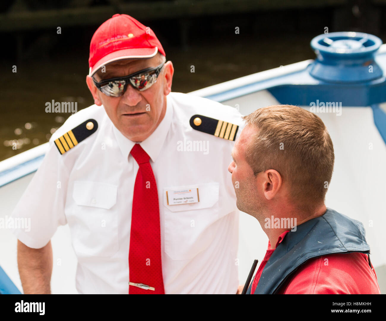 Captain talking to crew member hi-res stock photography and images - Alamy
