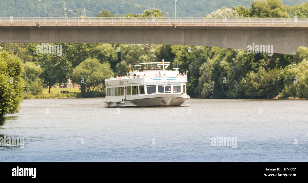 River cruise boat sailing under a bridge, Main River, Germany Stock ...