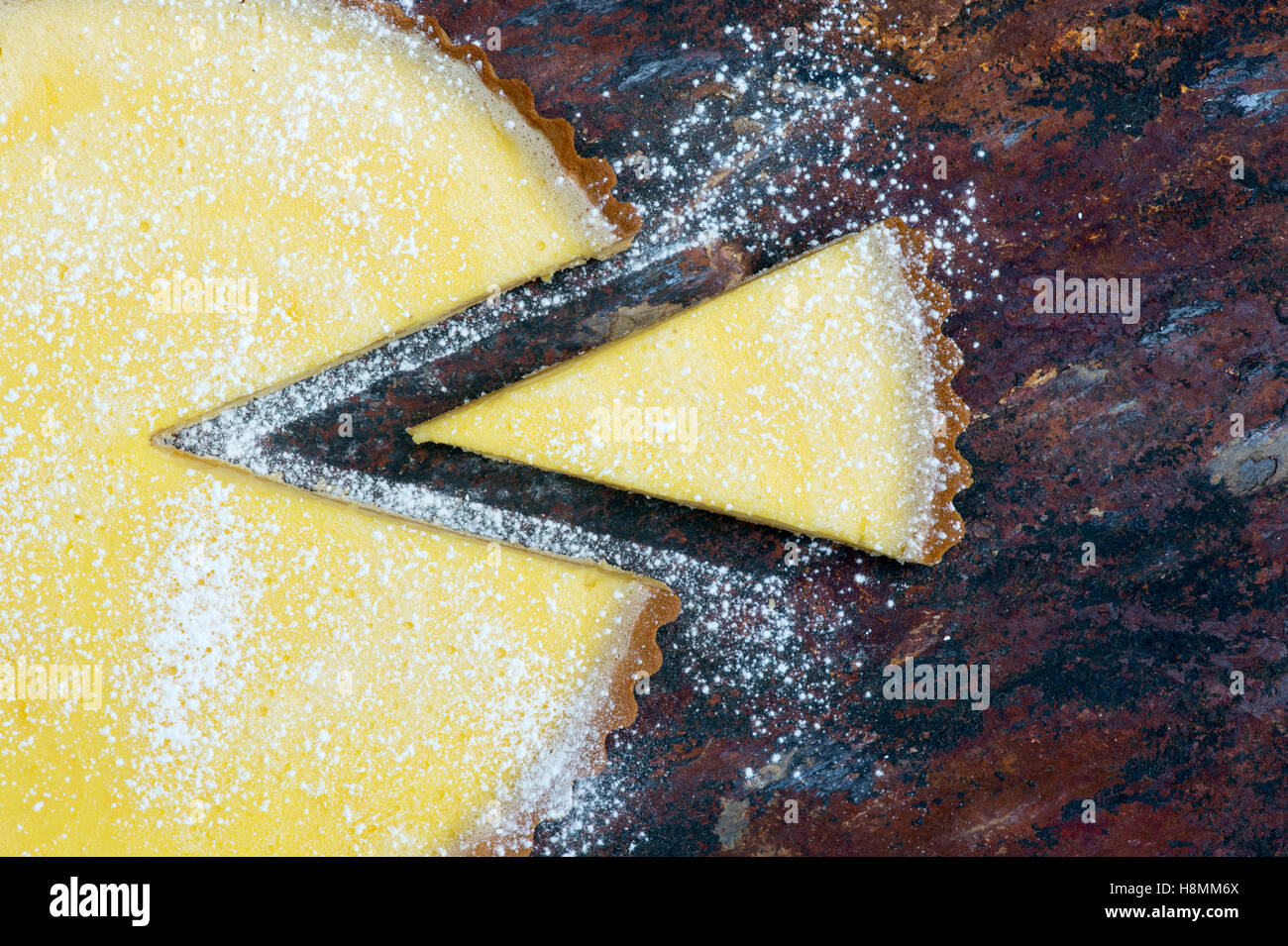 Homemade Lemon Tart on slate Stock Photo - Alamy