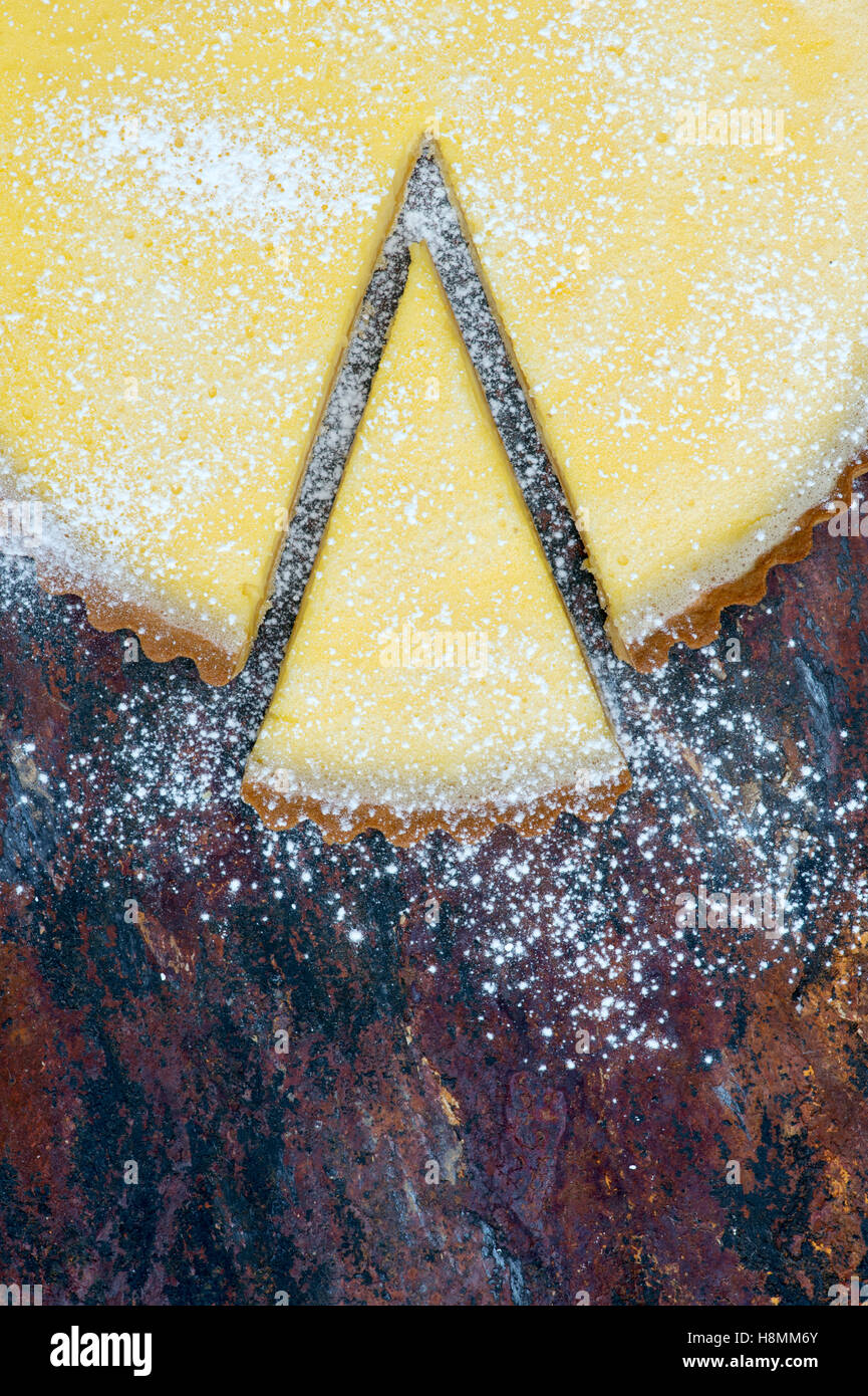 Homemade Lemon Tart on slate Stock Photo - Alamy