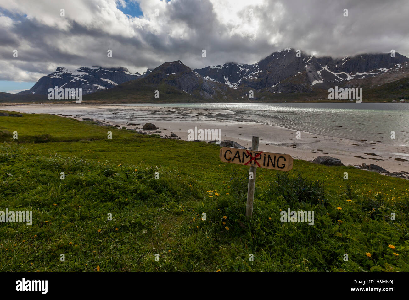 Camping sign. Bay at Kilan, near Flakstad, Lofoten Islands, Norway ...