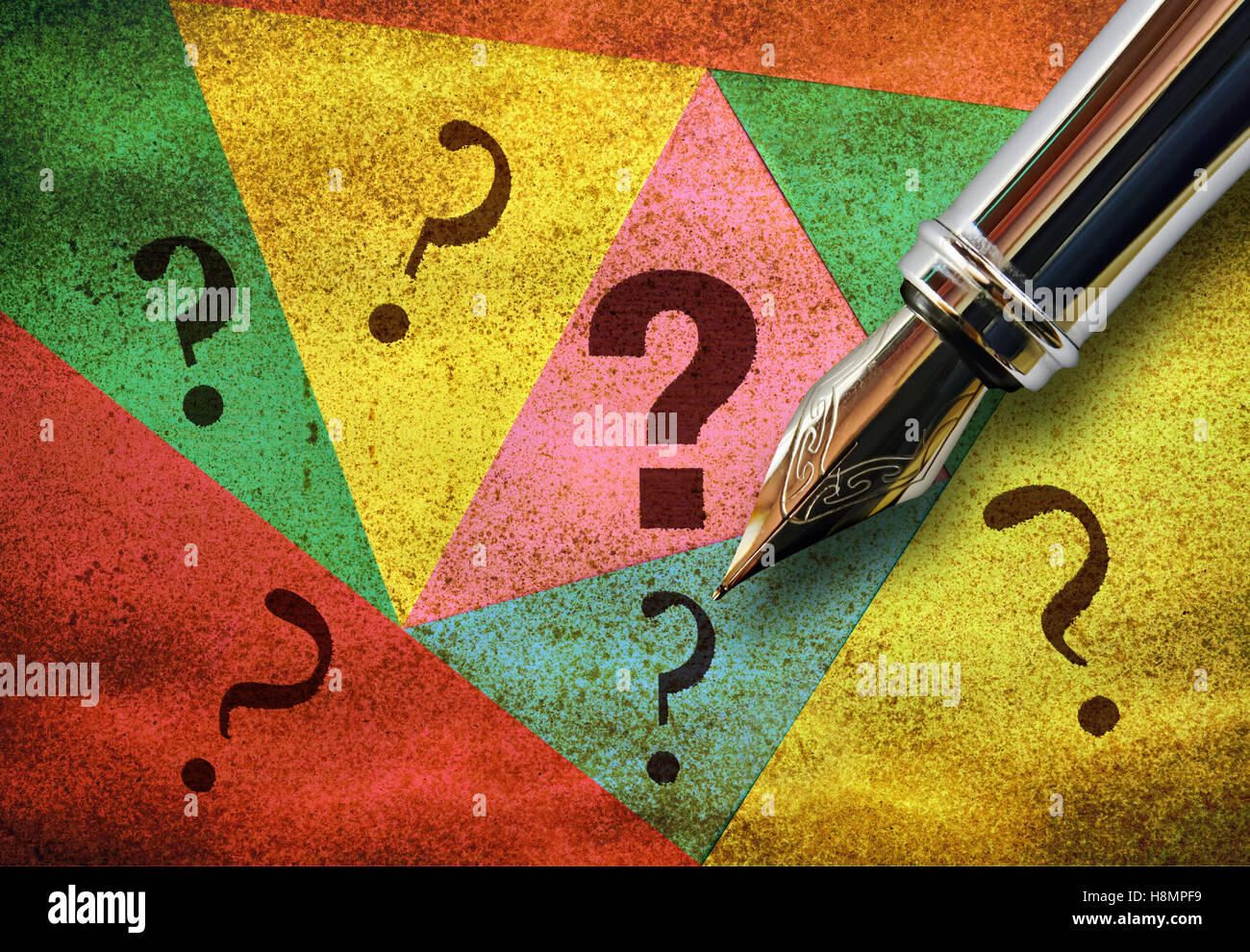 Fountain pen and question marks on multicolor background Stock Photo ...