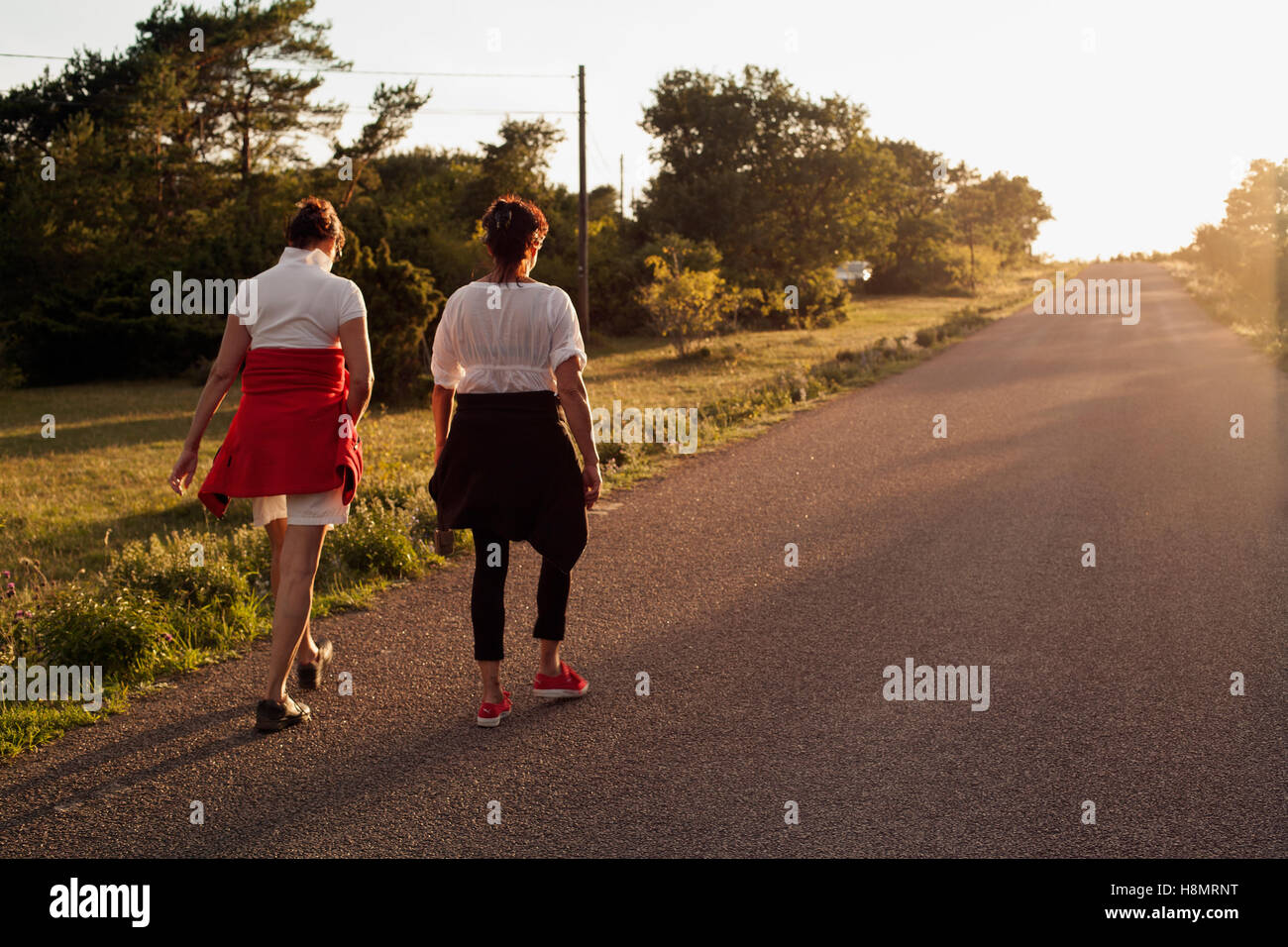 Walking along the road hi-res stock photography and images - Alamy