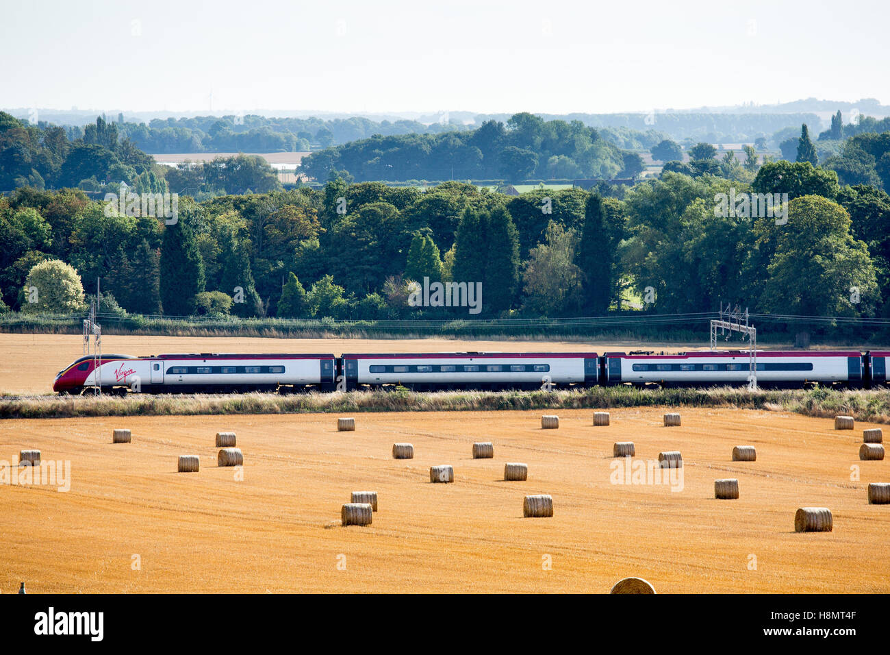 A Virgin train traveling between Atherstone to Polesworth on Trent ...