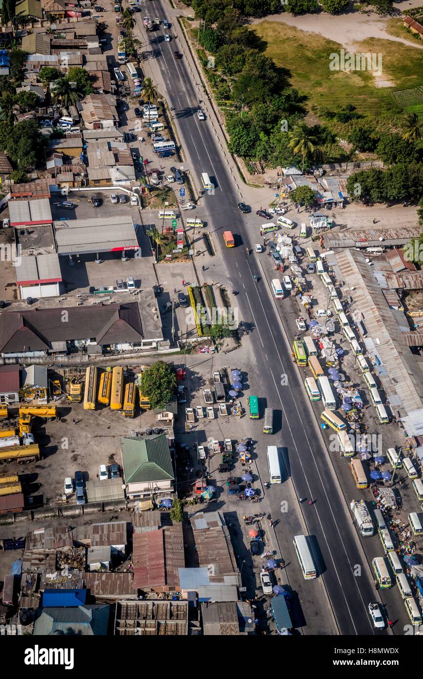 An aerial photograph shows the lively environment along a highway in a ...