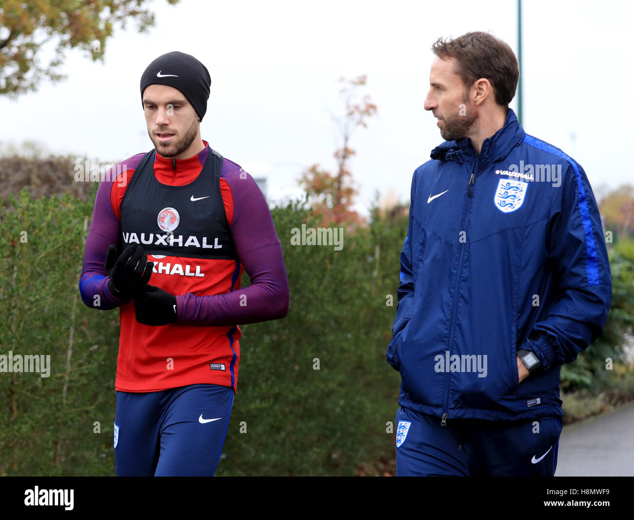 England's Jordan Henderson (left) and interim manager Gareth Southgate ...