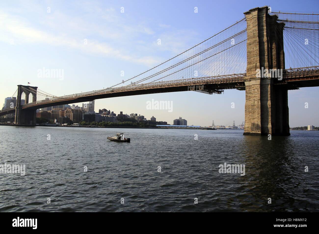 The Brooklyn Bridge connects Manhattan and Brooklyn and spans the East ...