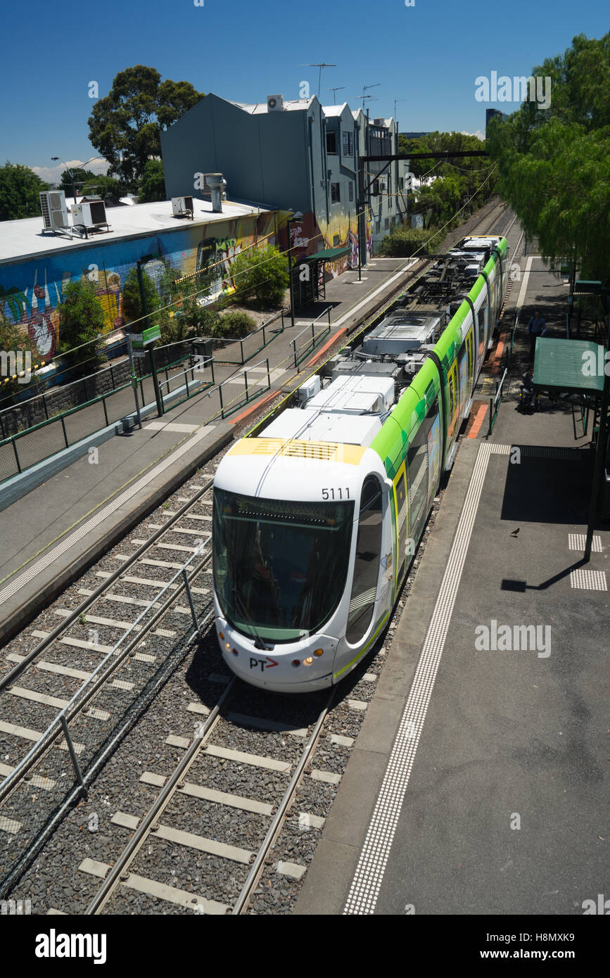 trams and tram stop on 86 line in south melbourne Stock Photo - Alamy