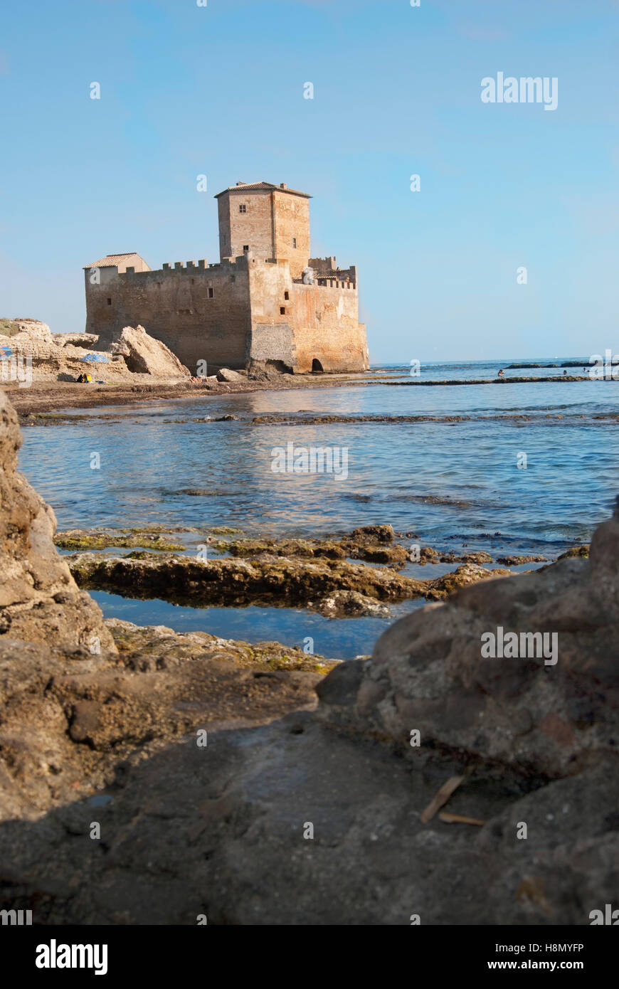 torre astura the castle near Rome immersed in the sea Stock Photo - Alamy