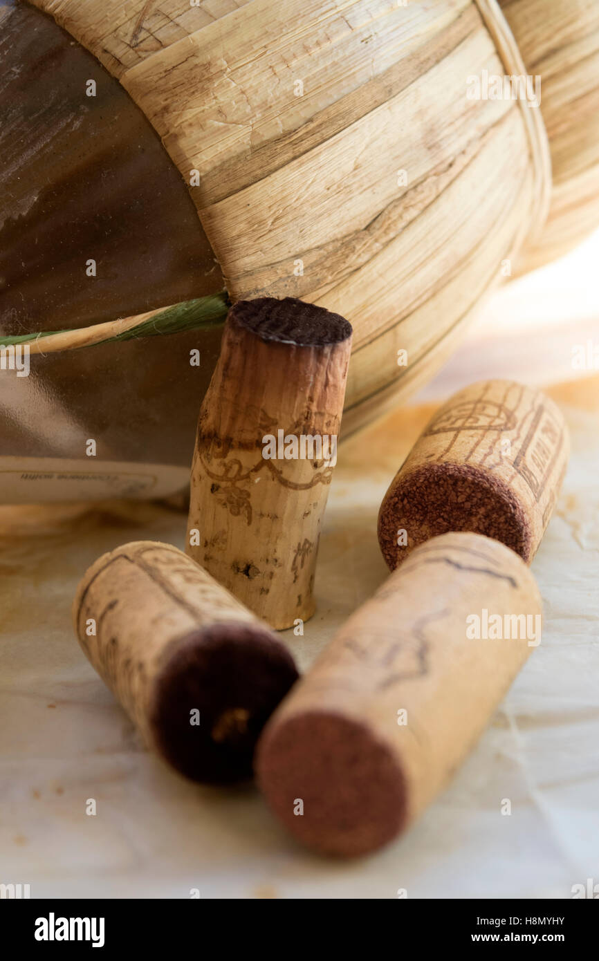 flask of aged wine with old corks Stock Photo - Alamy