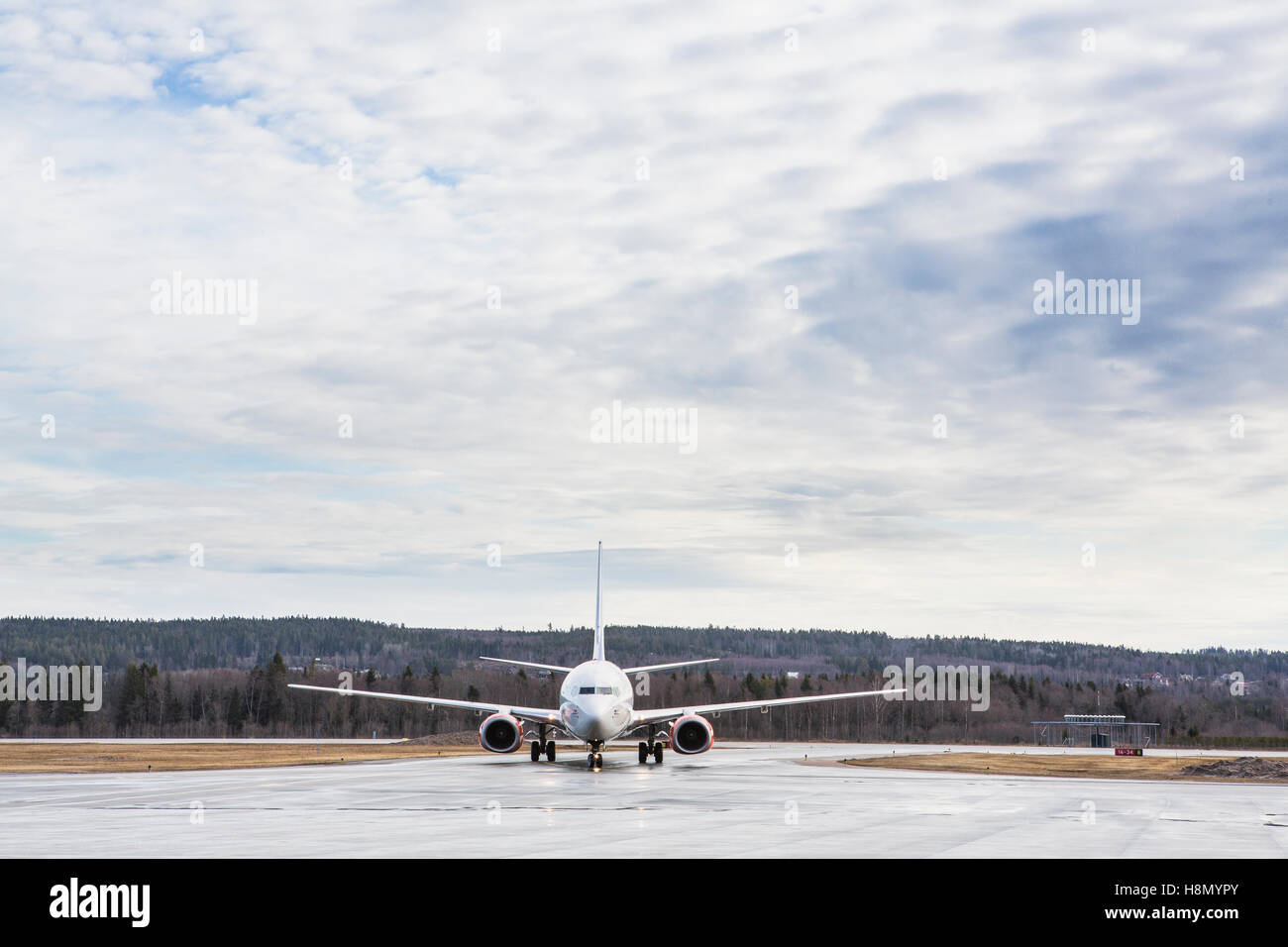 Airplane on runway Stock Photo - Alamy