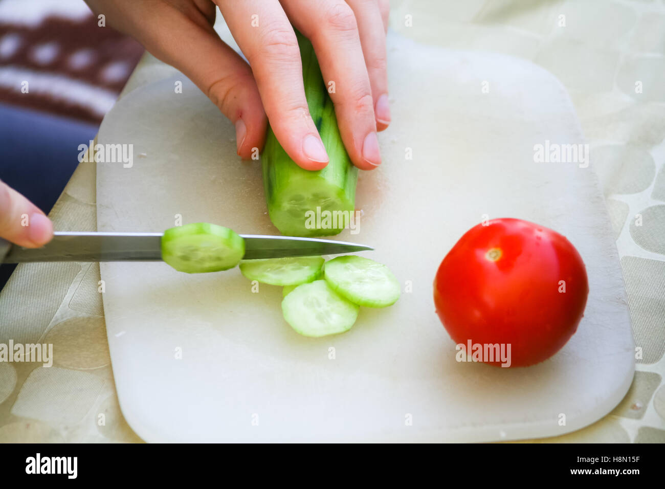 Cutting vegetables hi-res stock photography and images - Alamy