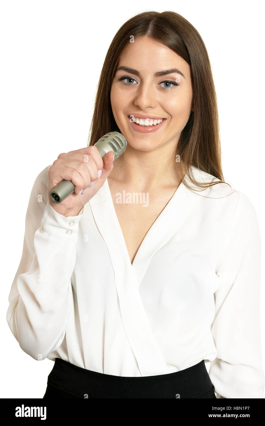 Young woman with microphone Stock Photo - Alamy